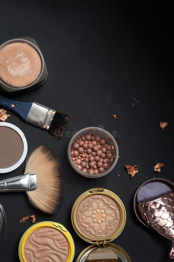 Set of Bronze Powder with Makeup Brushes on Black Background Stock ...