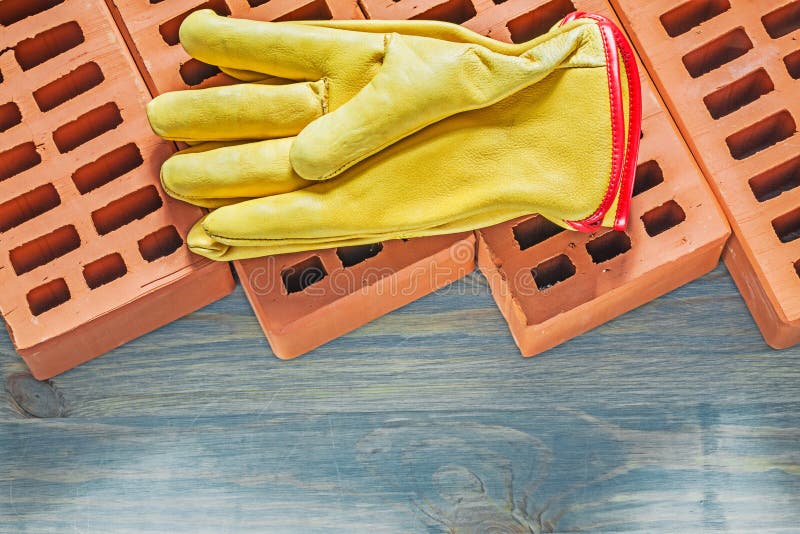 Set of Building Bricks Safety Gloves on Wooden Board Constructio Stock ...
