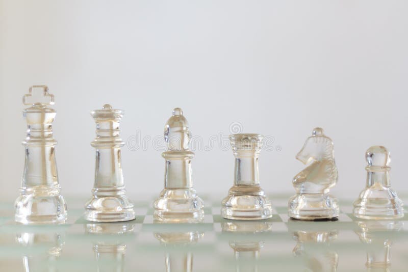 Set of Chess Pieces Standing in Line on Chessboard Stock Photo - Image ...