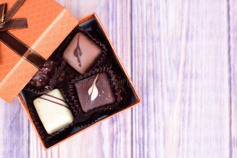 Set of Chocolates Stacked in a Gift Box Stock Photo - Image of ...