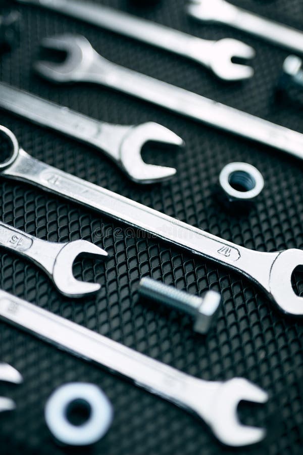 Set of Chrome Wrenches on Steel Surface. Mechanic Tools for Maintenance ...