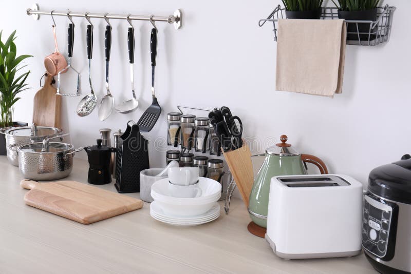 Set of Clean Cookware, Dishes, Utensils and Appliances on Table Stock ...