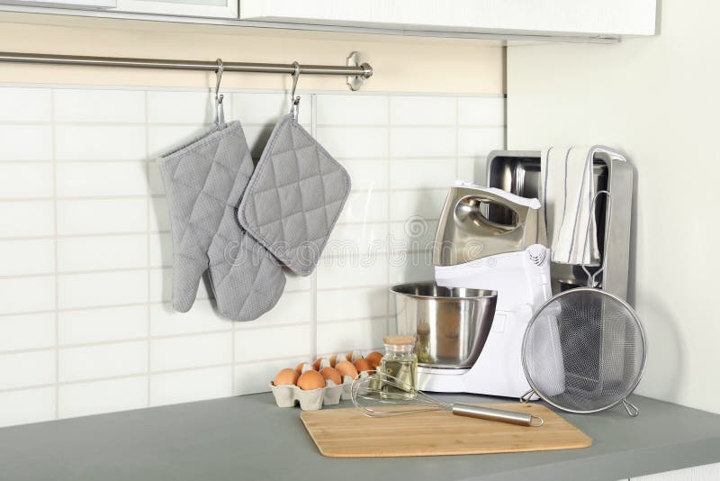 Set of Clean Cookware, Utensils and Eggs on Table Stock Photo - Image ...