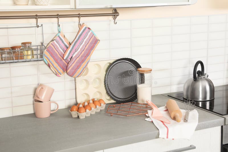 Set of Clean Cookware, Utensils and Products on Table Stock Photo ...