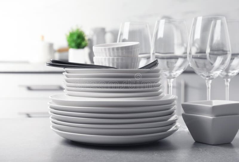 Set of Clean Dishes and Cutlery on Table Stock Image - Image of ceramic ...