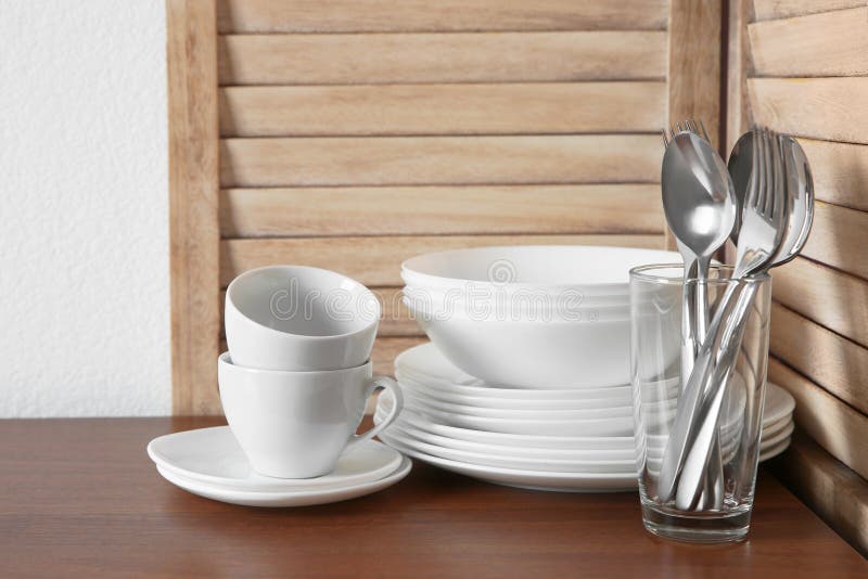 Set of Clean Dishes and Cutlery on Table Stock Image - Image of party ...