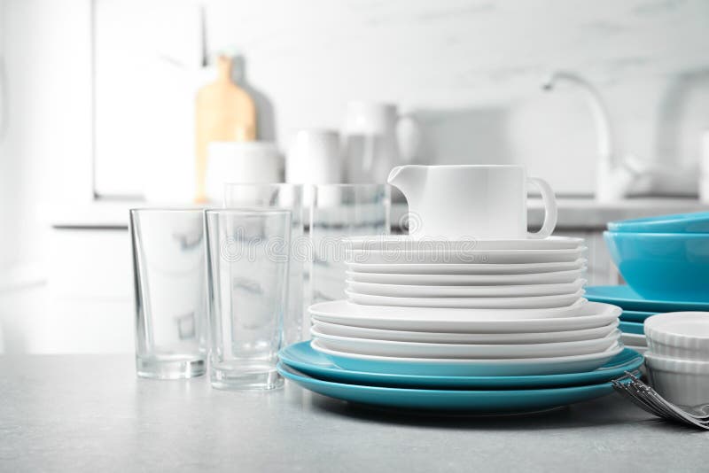 Set of Clean Dishes on Table Stock Photo - Image of dish, decor: 136837172