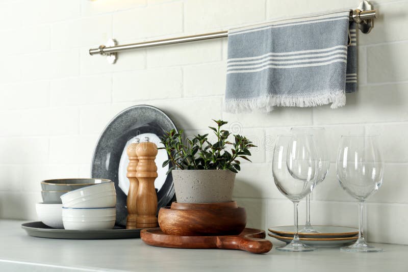 Set of Clean Tableware on White Countertop in Kitchen Stock Image ...
