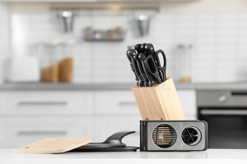 Set of Clean Utensils on Table in Kitchen Stock Photo - Image of dinner ...