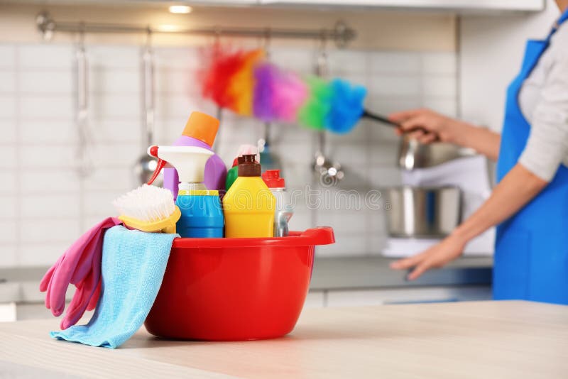 Set of Cleaning Supplies on Table in Kitchen. Stock Photo - Image of ...