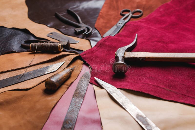 Set of Cobbler Tools on a Pieces of Colorful Leather. Stock Photo ...
