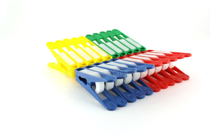 Set of color clothes-pegs stock photo. Image of yellow - 25778528
