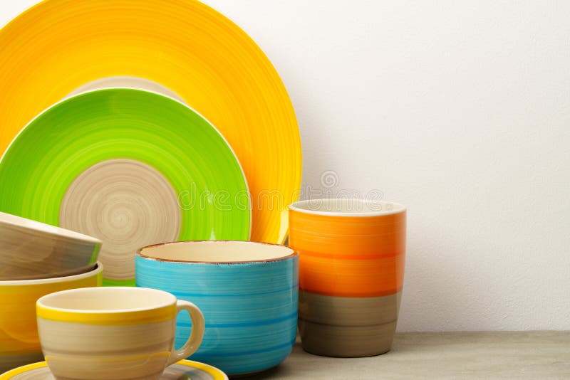 Set of Colored Ceramic Dishware Front View Stock Photo - Image of ...