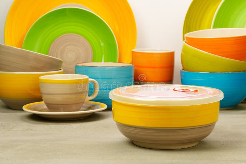 Set of Colored Ceramic Dishware Front View Stock Image - Image of table ...