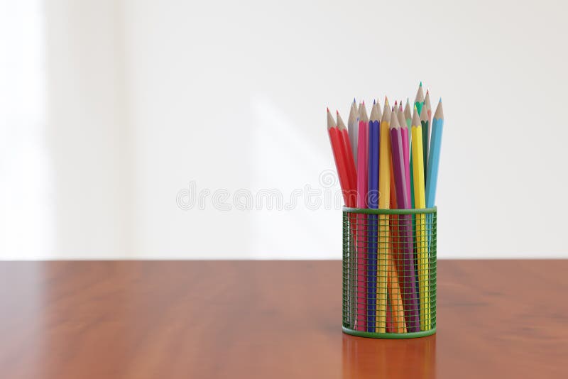 Set of Colored Pencils in a Basket on a Wooden Table and White ...