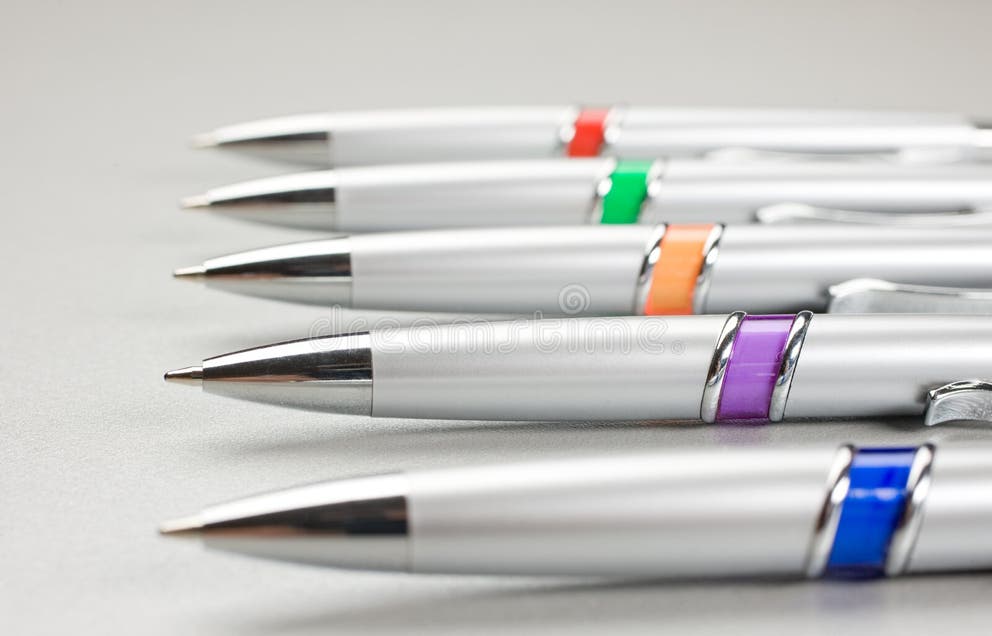 Set of Colored Pens on Table Stock Photo - Image of chrome, black: 14989466