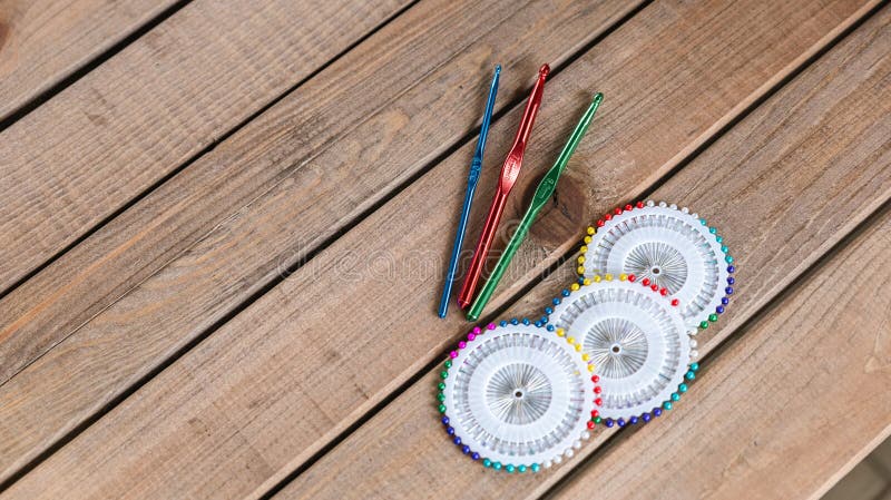 Set of Colorful Crochet Hooks and Several Wheels of Sewing Pins ...
