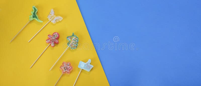 Set of Colorful Lollipops on Yellow and Blue Background. Beautiful ... Set of Colorful Lollipops on Yellow and Blue Background. Beautiful ...