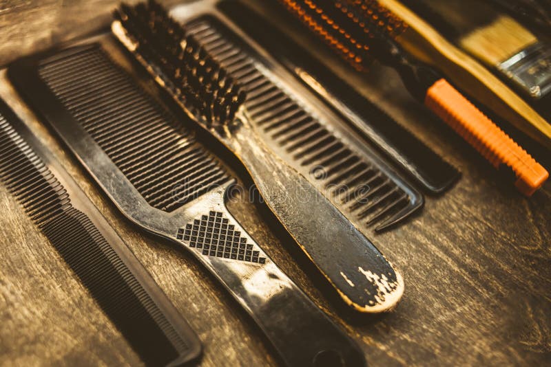 A Set of Combs for a Haircut Lie on a Shelf in the Salon Stock Photo ...
