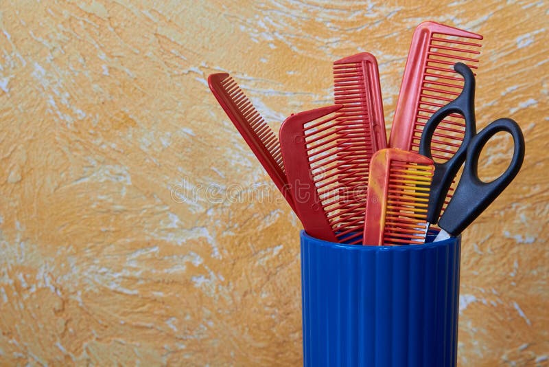 Set of Combs and Scissors,standing in a Plastic Cup Set of Combs for ...
