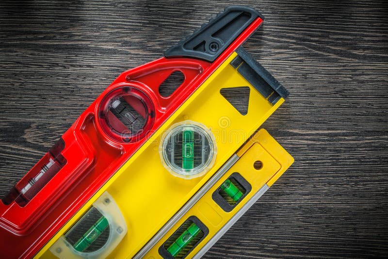 Set of Construction Levels on Wooden Board Stock Photo - Image of ...