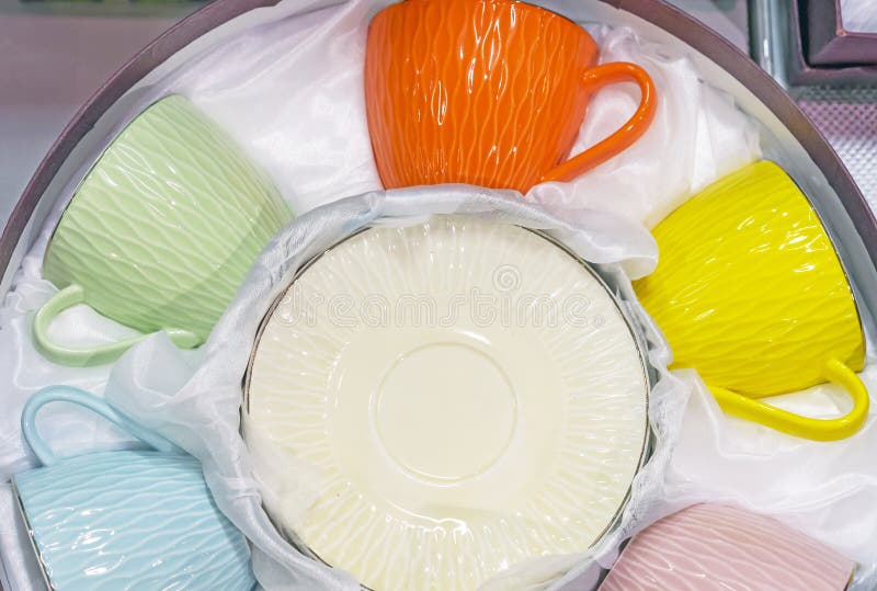 Set of Cups of Different Colors with Saucers Stock Photo - Image of ...