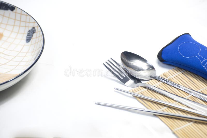 Set of Cutlery and Plates are Placed on a Clean White Table. Ready for ...
