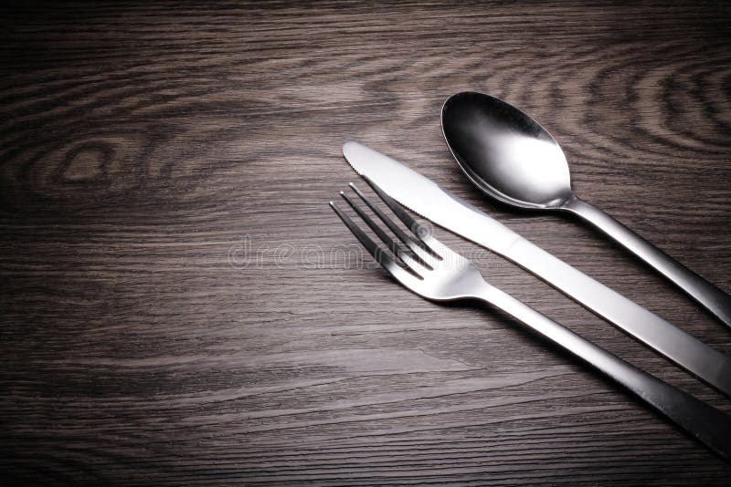 A Set of Cutlery on Wooden Background Stock Image - Image of clean ...