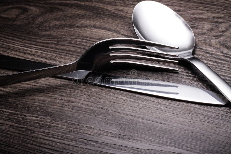 A Set Of Cutlery On Wooden Background Stock Image - Image of knife ...