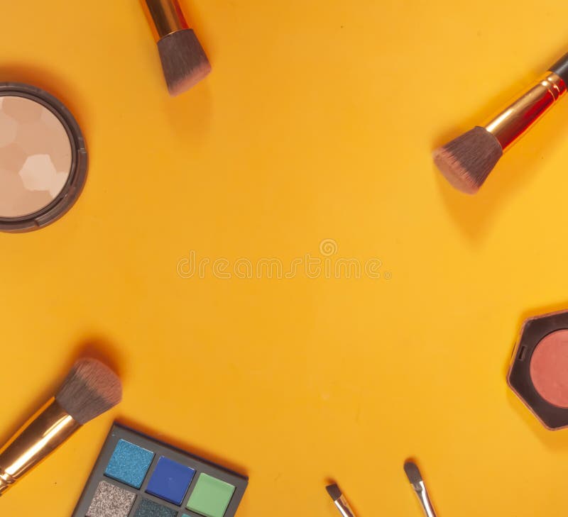 Set of Decorative Cosmetics on Yellow Background. Make Up Concept Stock ...