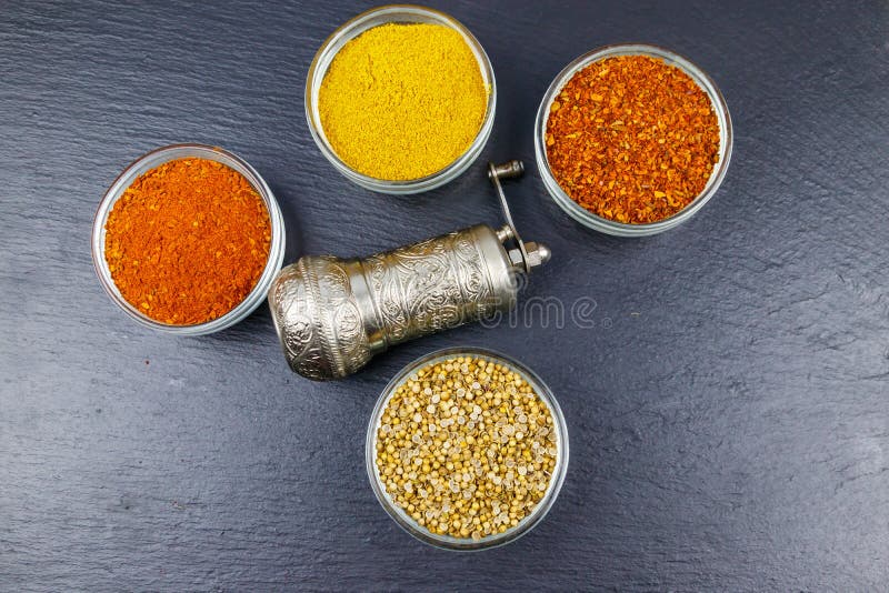 Set of Different Aromatic Spices and Spice Mill on Black Slate. Top ... Set of Different Aromatic Spices and Spice Mill on Black Slate. Top ...