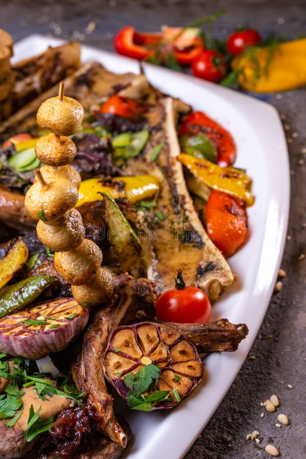 A Set of Different Beef Meat Dishes on a White Plate Stock Image ...