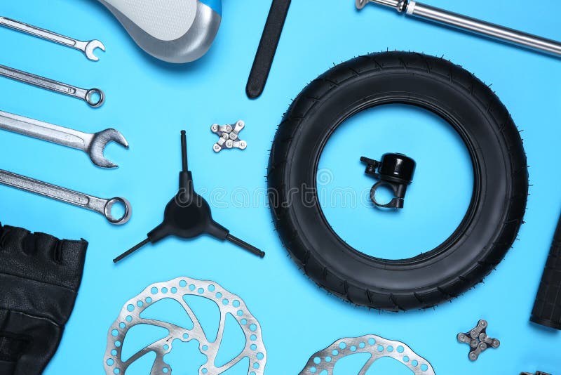 Set of Different Bicycle Tools and Parts on Blue Background, Flat Lay ...