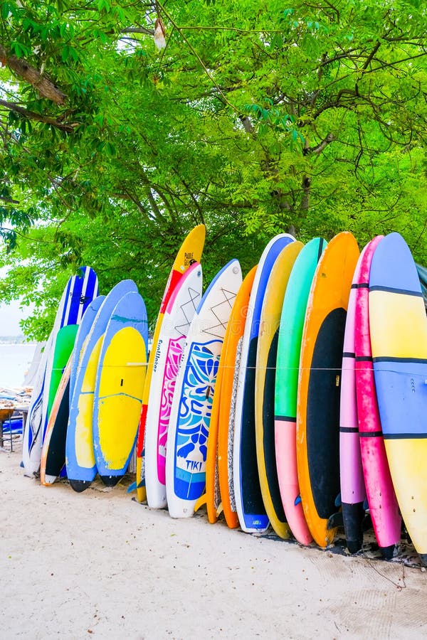Set of Different Bright Colorful Surf Boards in a Stack Stock Image ...