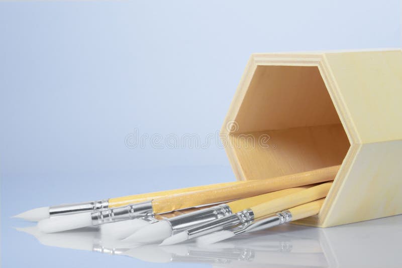 Set of Different Brushes in the Wood Box/ Glass on Gray, Front View ...