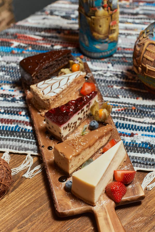 Set of Different Cake Slices on Wooden Table. Stock Image - Image of ...