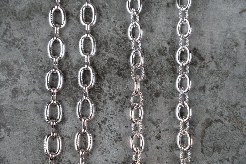 Set of Different Chains on a Concrete Background. Chain Connection ...