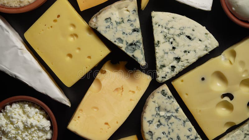 Set of Different Cheeses on Black Background, Close Up, Top View ...