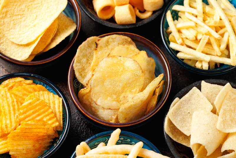 Set of Different Crispy Potato Chips in Bowls. Snack Food Stock Image ...