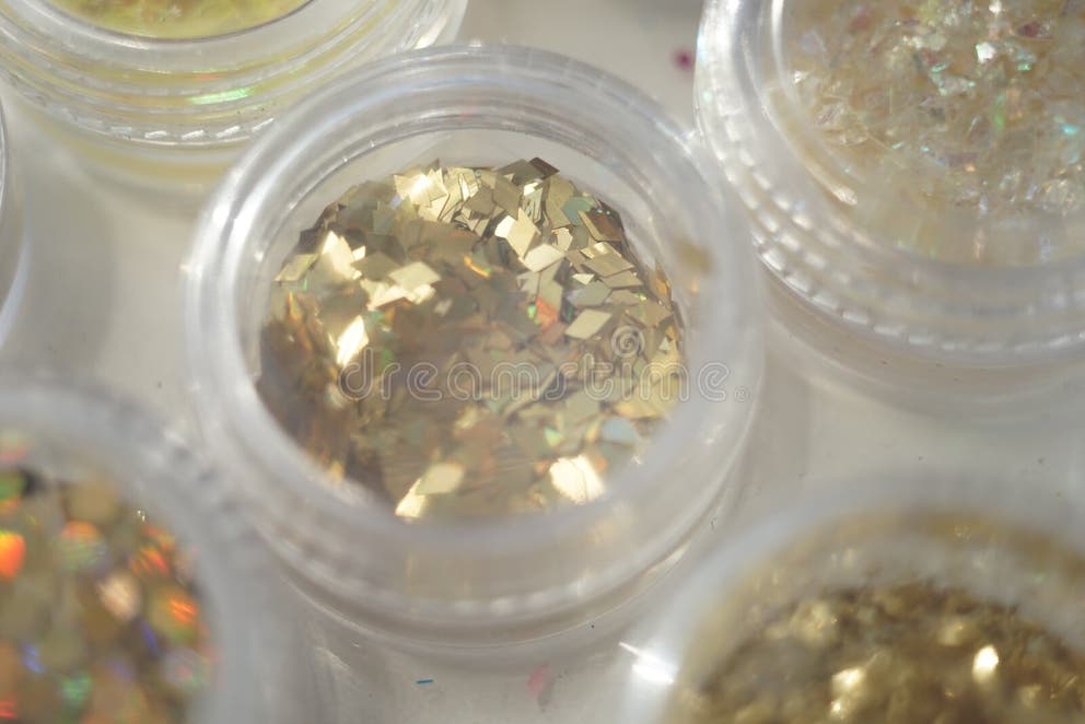 Set of Different Golden Spangles in Plastic Packaging Stock Photo ...