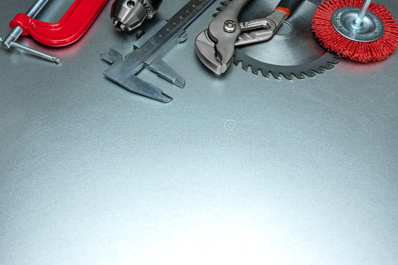 Set of Different Hand Tools on Grey Metal Workbench Stock Photo - Image ...