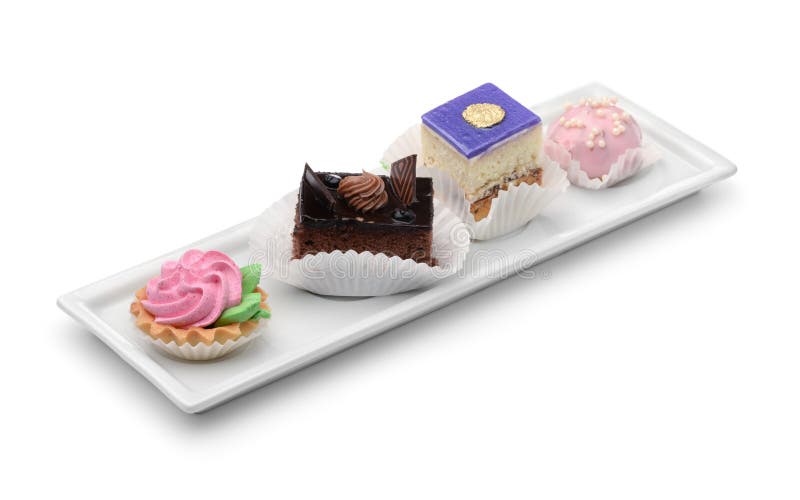 Set of Different Mini Cakes on Rectangular Plate Stock Image - Image of ...