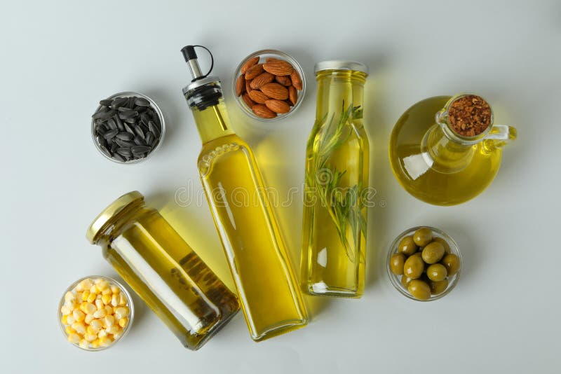 Set of Different Oils on Light Gray Background Stock Photo - Image of ...