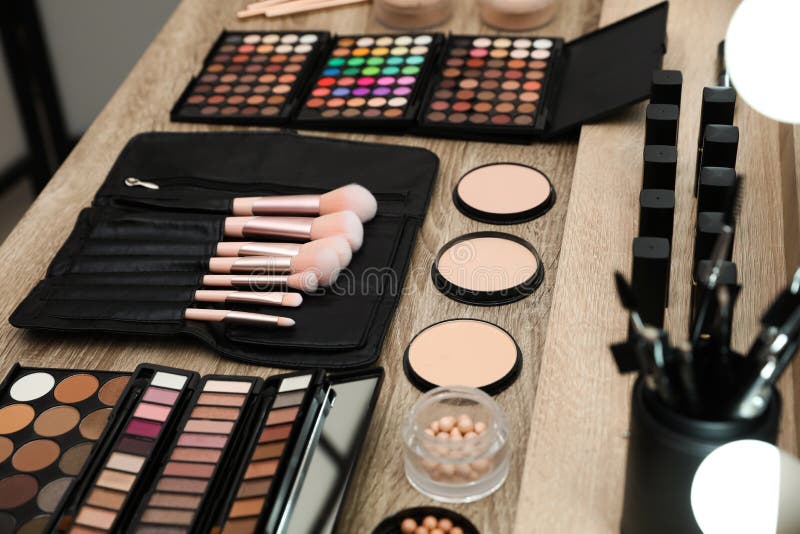 Set of Different Professional Makeup Products on Table in Studio Stock ...