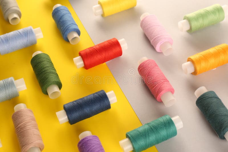 Set of Different Sewing Threads on Color Background Stock Image - Image ...