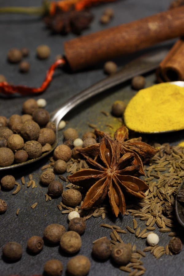 A Set of Different Spices Close-up on a Dark Table. Spice Background ... A Set of Different Spices Close-up on a Dark Table. Spice Background ...