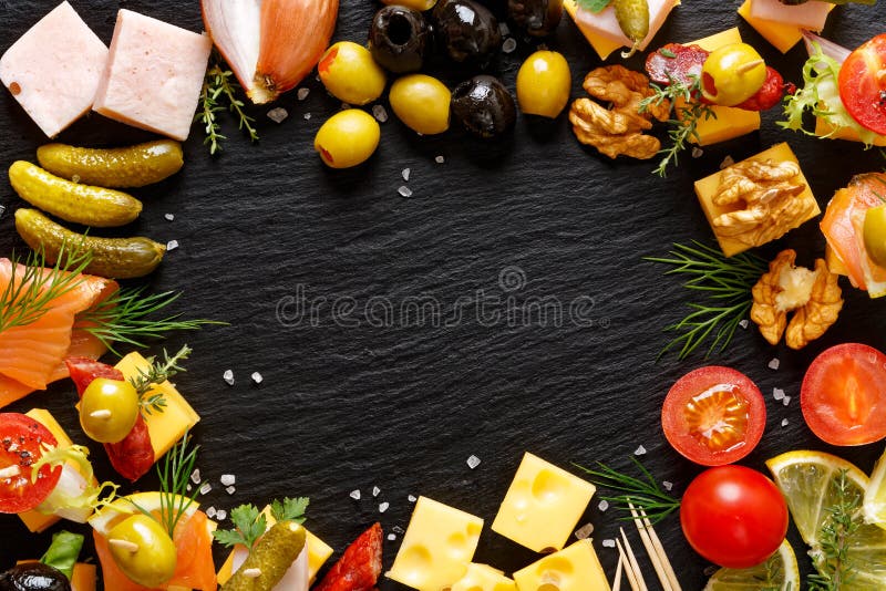Set of Different Tasty Appetizers, Snacks and Ingredients on a Black ...