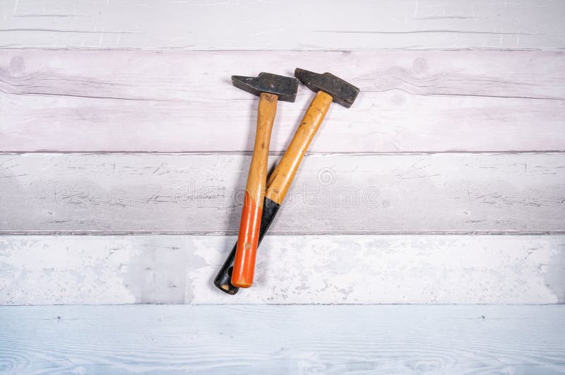 Set of Different Types of Hammers on a Wooden Background. Top View ...