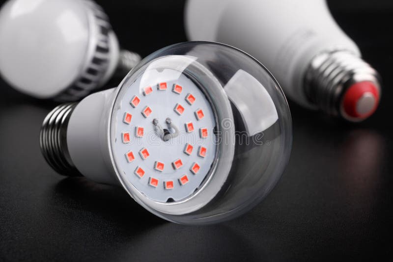 Set with Different Types of LED Bulbs on Black Background. Close Up ...