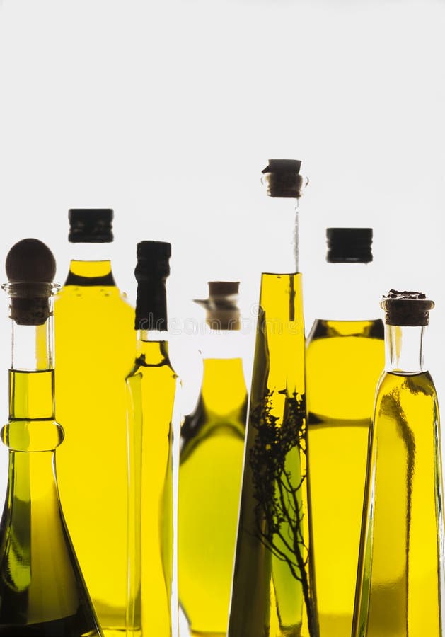 Set of Different Types of Oil Bottles Backlit Stock Photo - Image of ...